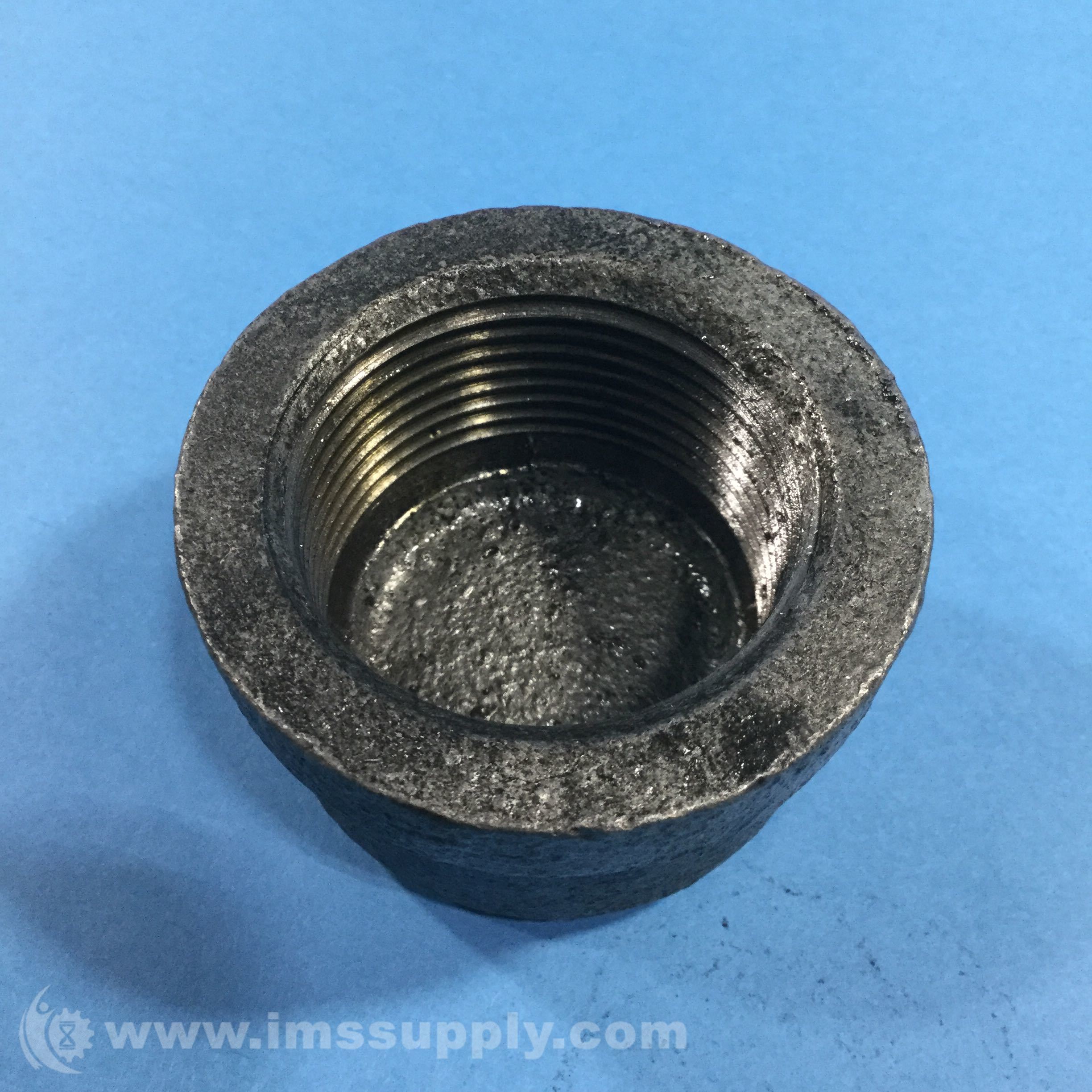 Ward Size 1-1/4 inch Black Malleable Iron Threaded Cap - IMS Supply