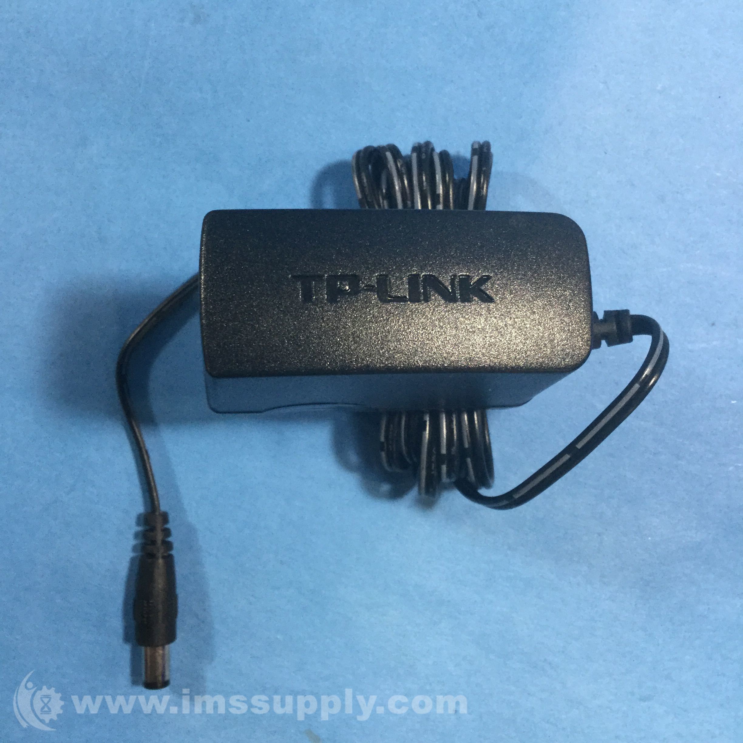 TP-Link T090060-2B1 AC Adapter 9VDC 0.6A - IMS Supply