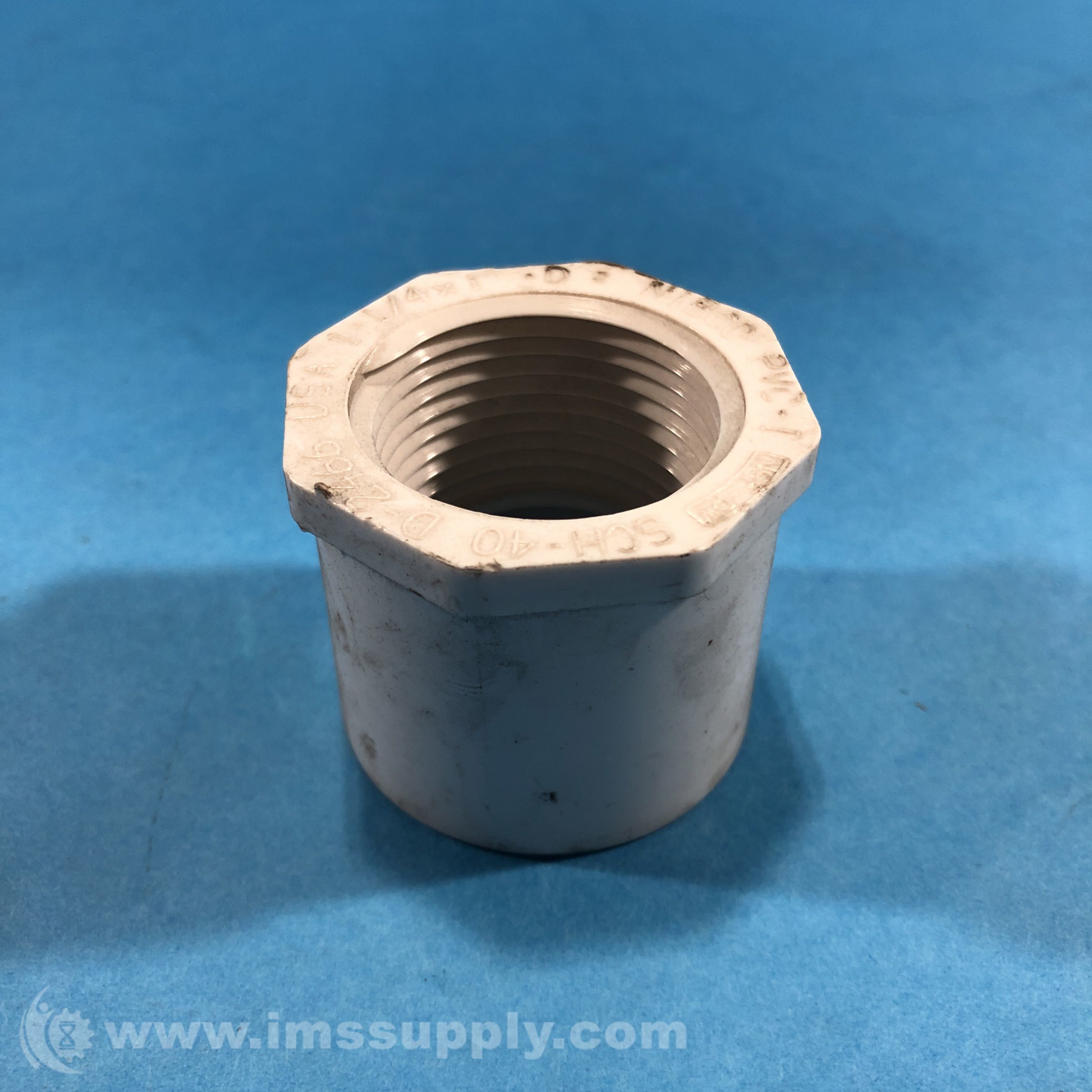 Nibco PVC-1 Threaded Bushing, Size 1-1/4 x 1 - IMS Supply