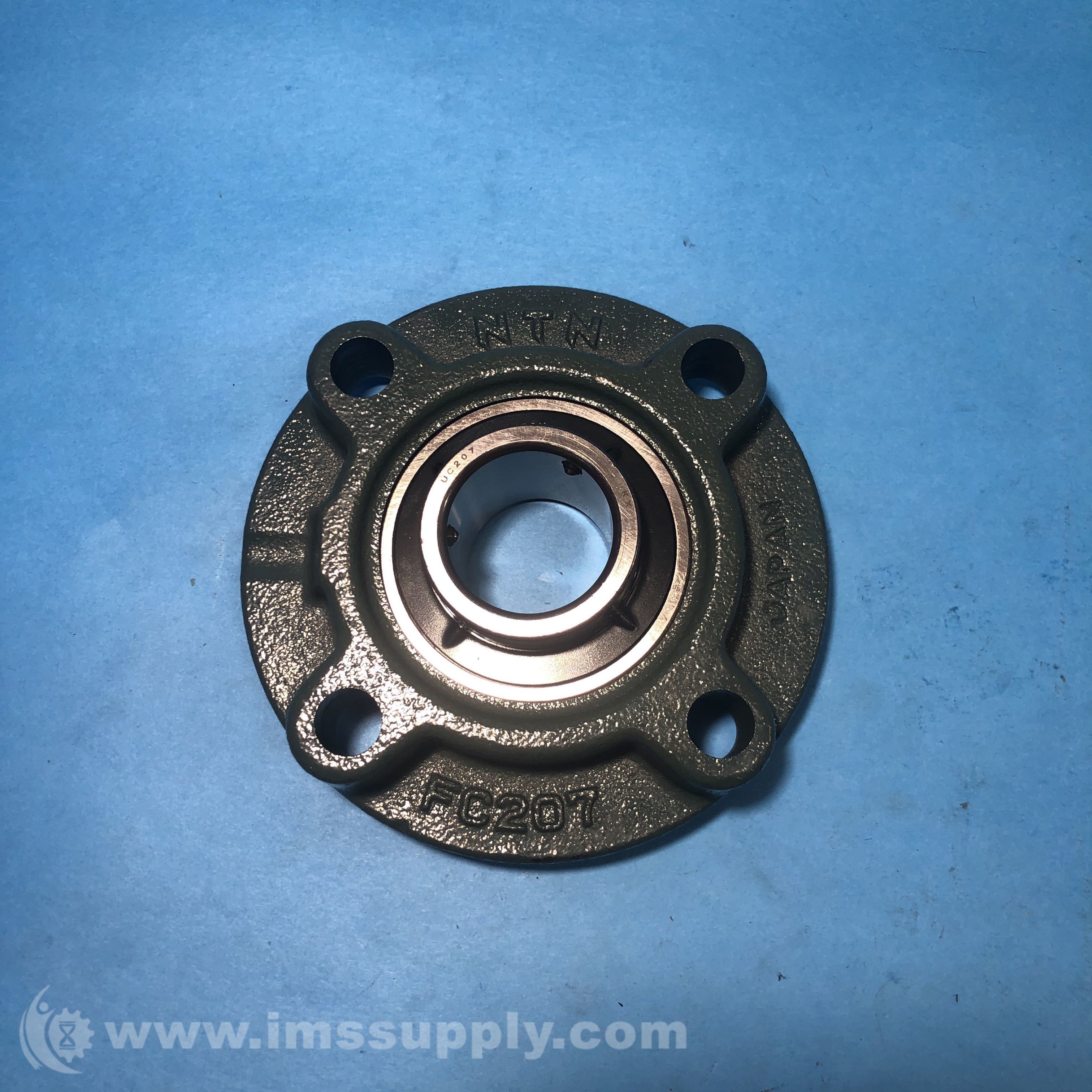 NTN FC207 radial insert ball bearing w/ cast housing - IMS Supply