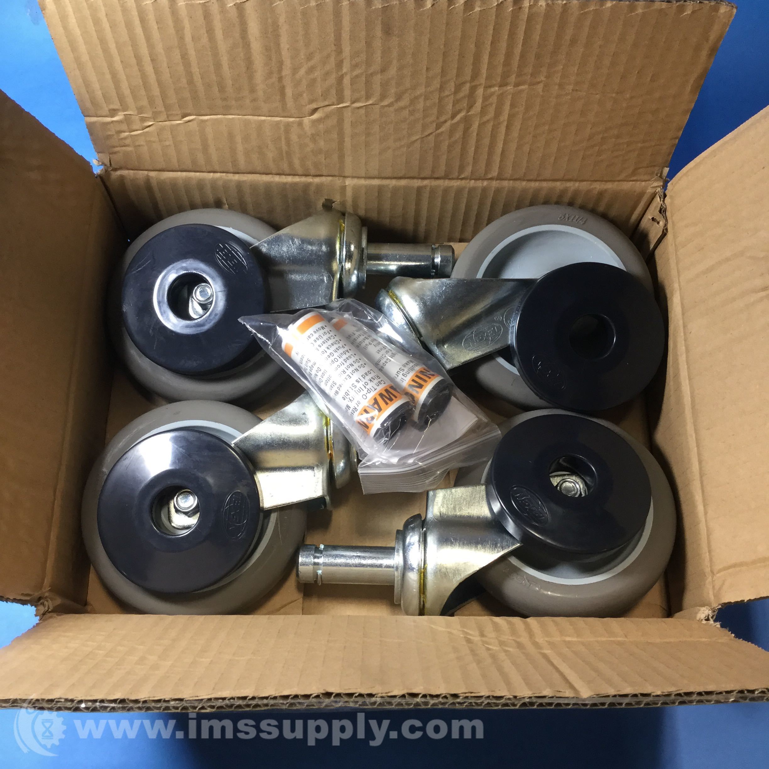 NEXEL Industries 5X11/4 Swivel Stem Caster w/Donut Bumper - IMS Supply